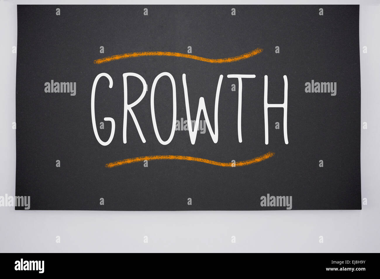 Growth written on big blackboard Stock Photo - Alamy
