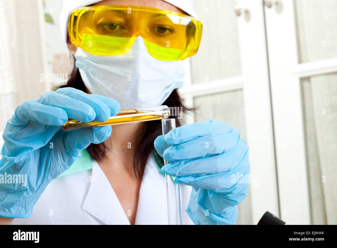 Mixing chemical sample research in hi-res stock photography and images ...