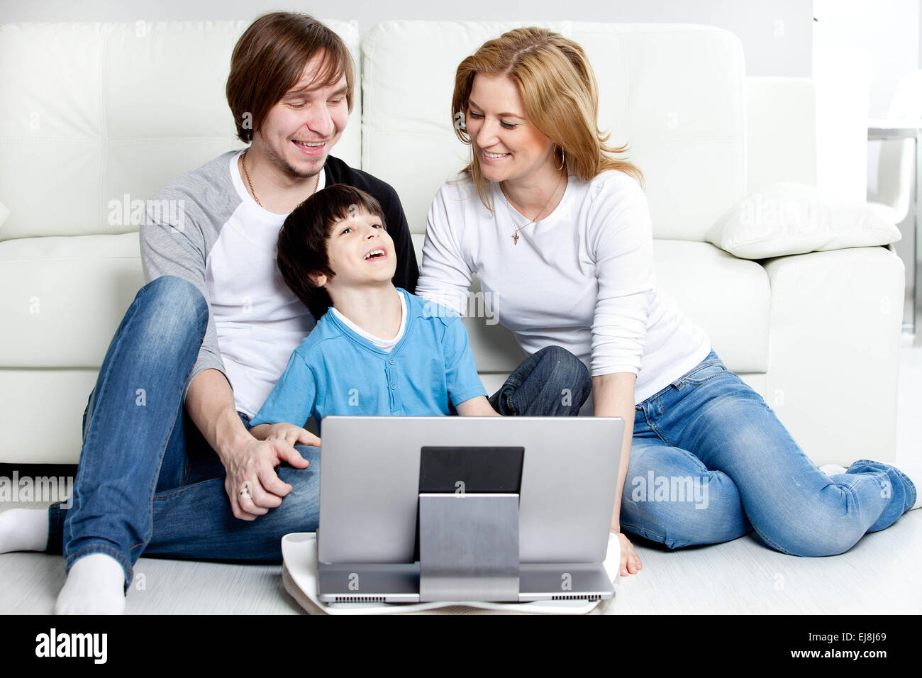 Children laptop parents hi-res stock photography and images - Alamy