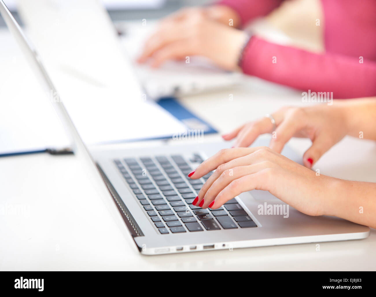 Female typing data on laptop hi-res stock photography and images - Alamy