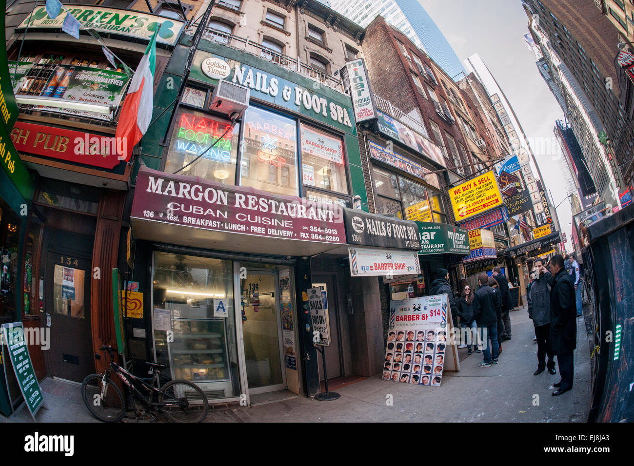 Small stores and restaurants along West 46th Street, between Sixth and ...