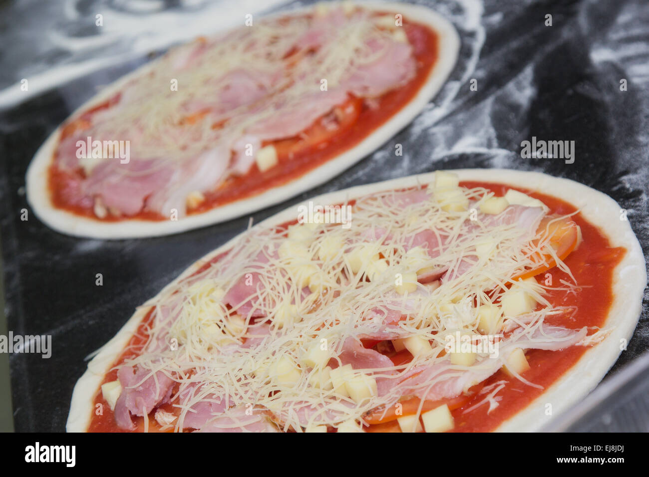 pizza with cheese and ham Stock Photo - Alamy