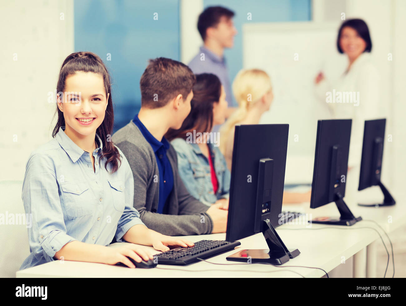students with computer monitor at school Stock Photo - Alamy