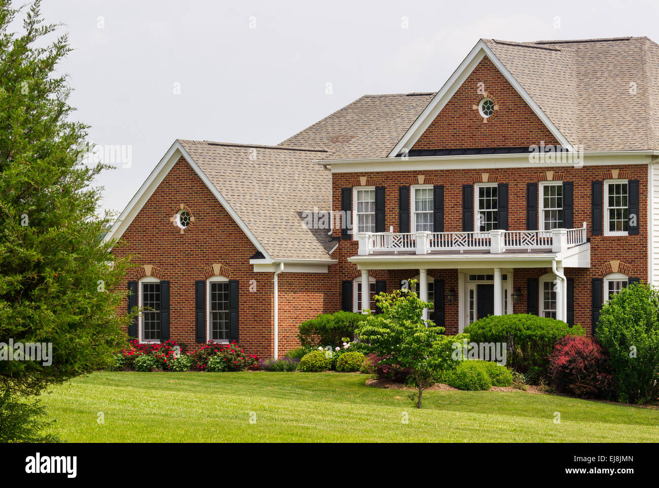 Front of large single US family home Stock Photo - Alamy
