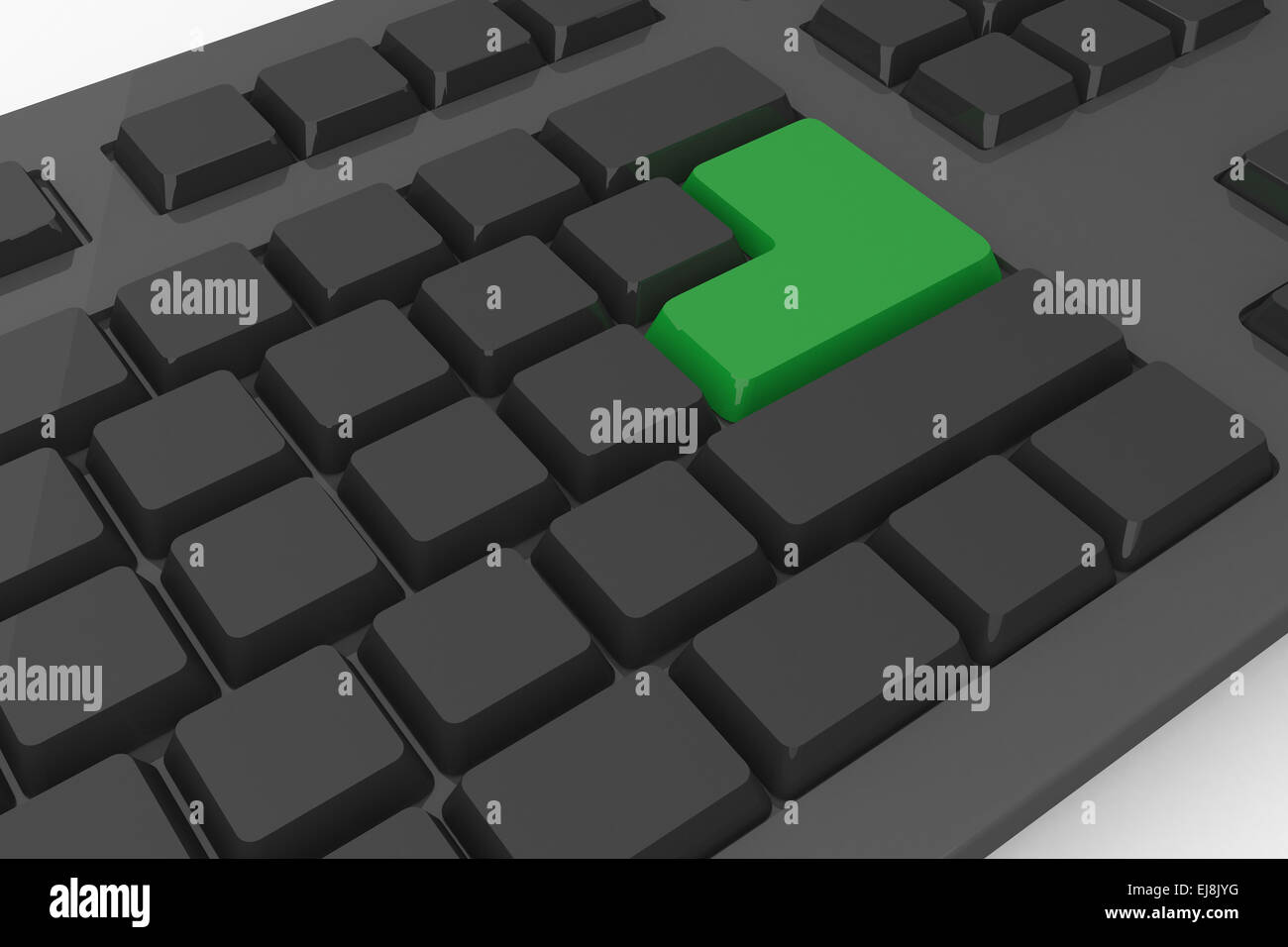 Black keyboard with green key Stock Photo - Alamy