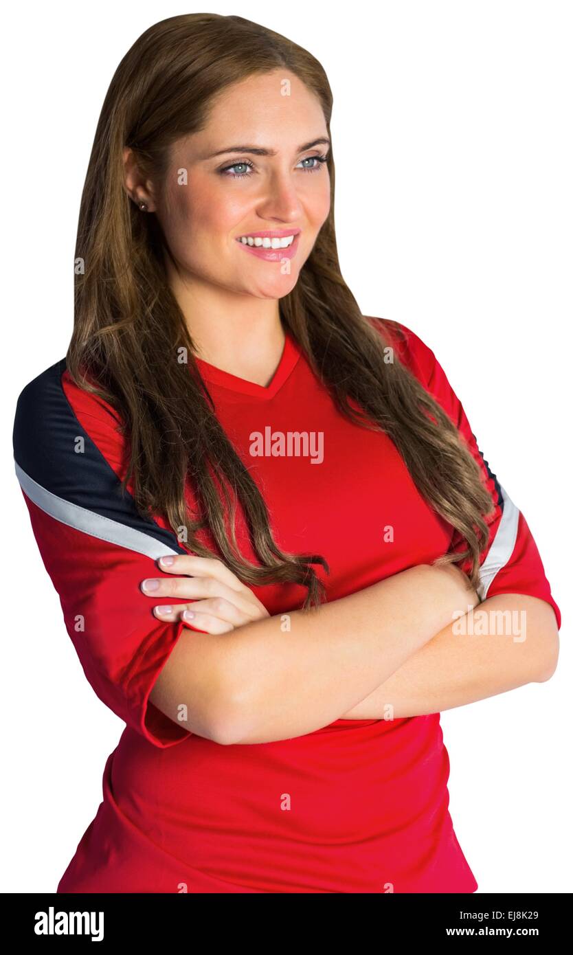 Pretty football fan smiling Stock Photo - Alamy