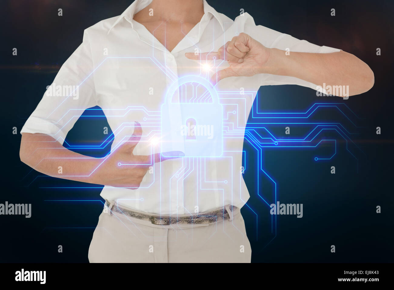 Businesswoman showing lock on circuit board Stock Photo - Alamy