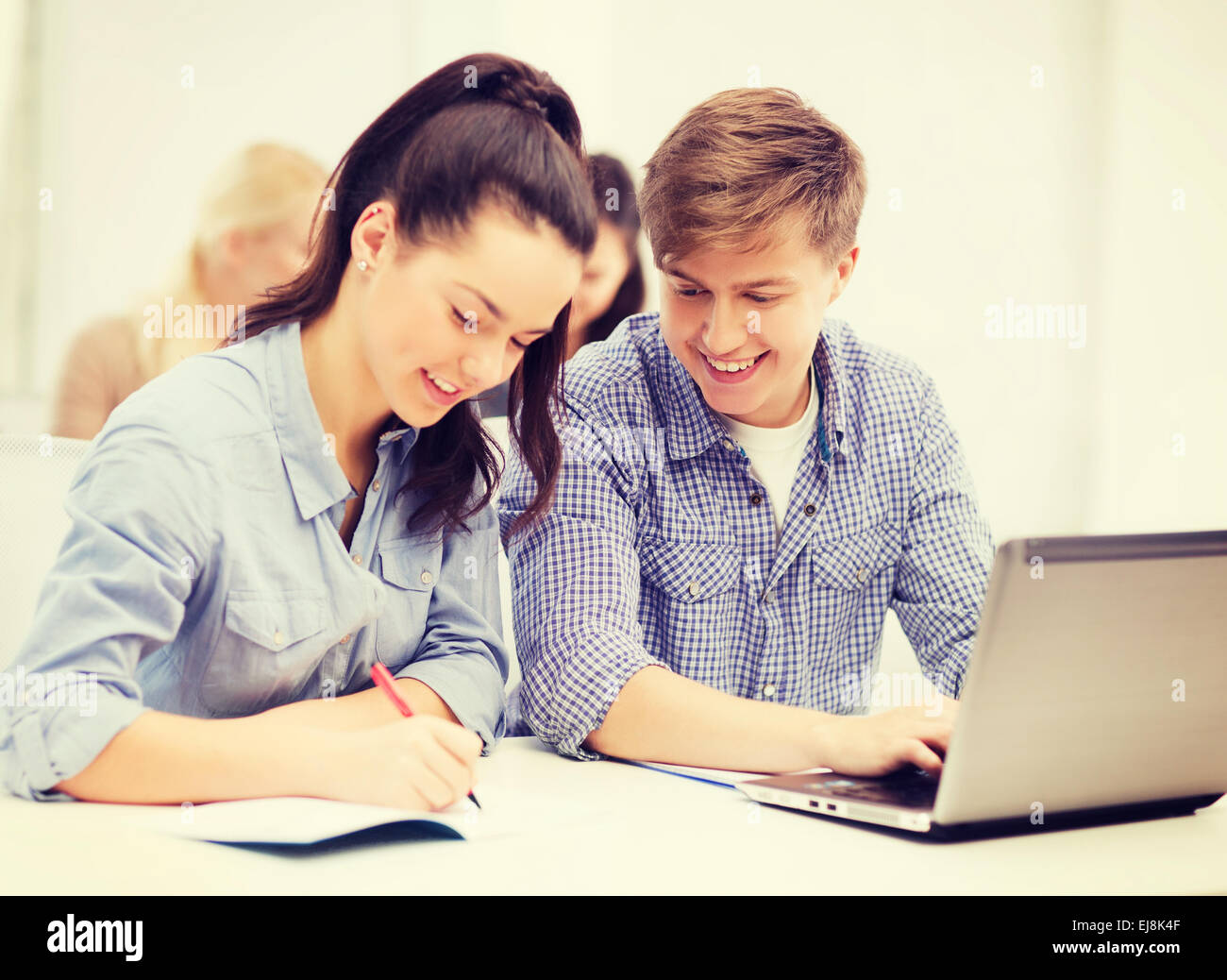 students with laptop and notebooks at school Stock Photo - Alamy