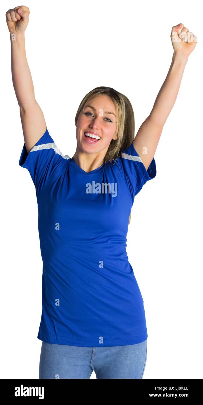 Smiling football fan in blue on white background Stock Photo - Alamy