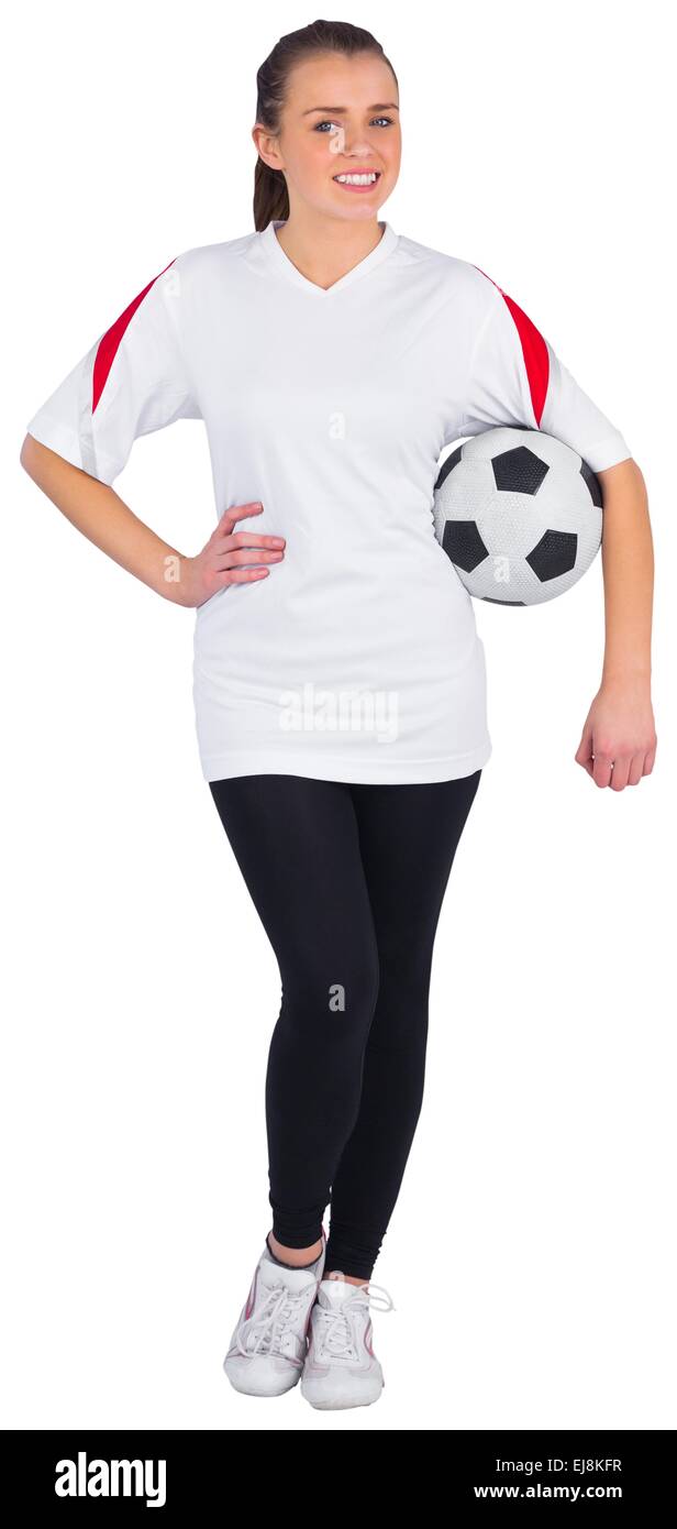 Pretty football fan in white smiling on white background Stock Photo ...
