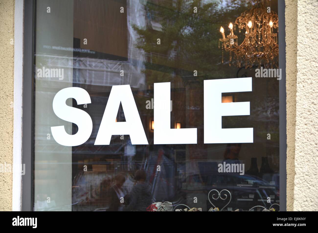 storefront with the words sale Stock Photo - Alamy