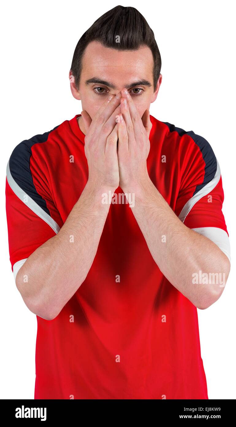 Nervous football fan looking ahead Stock Photo - Alamy