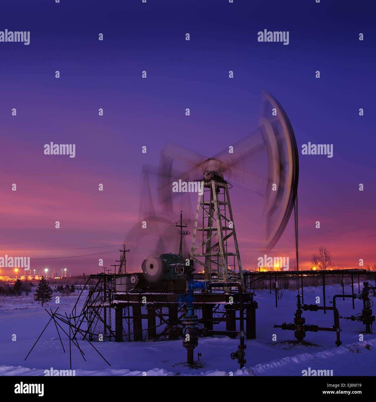 Oil rig at night Stock Photo - Alamy