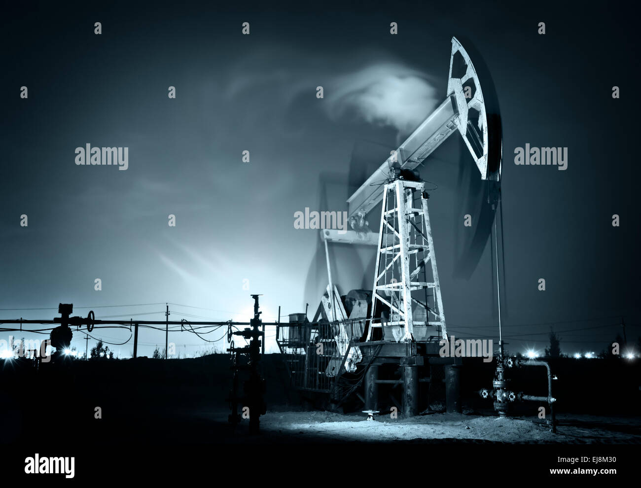 Oil Rig at night Stock Photo - Alamy