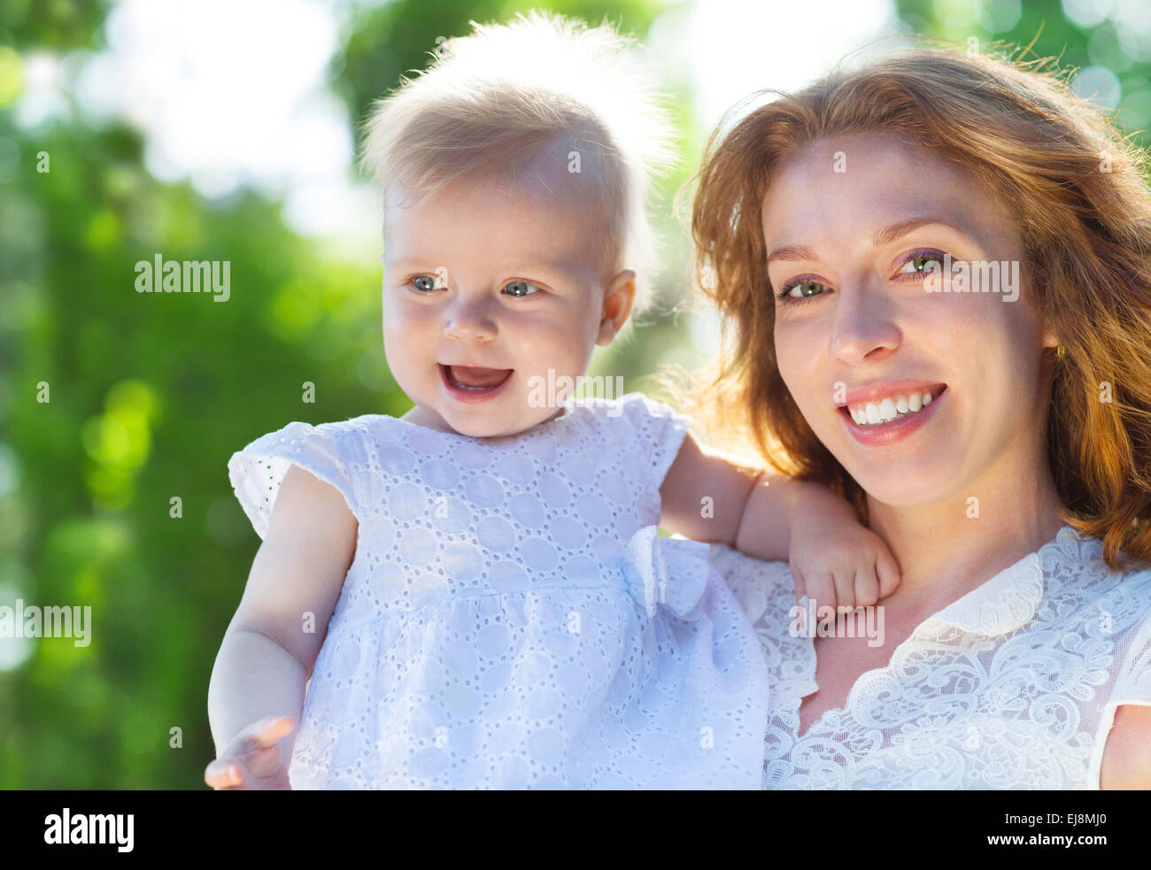 Beautiful Mother And Baby outdoors Stock Photo - Alamy