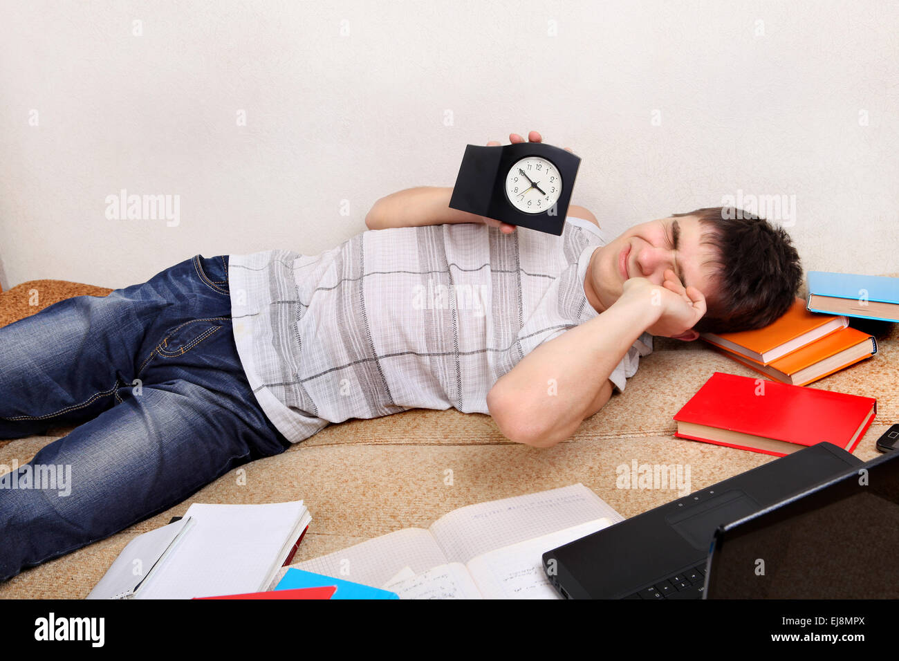 Tired person sofa hi-res stock photography and images - Alamy