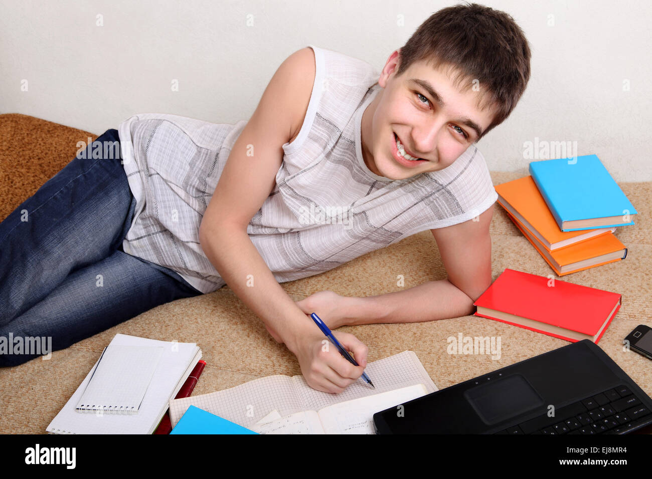 Teenager doing Homework Stock Photo - Alamy
