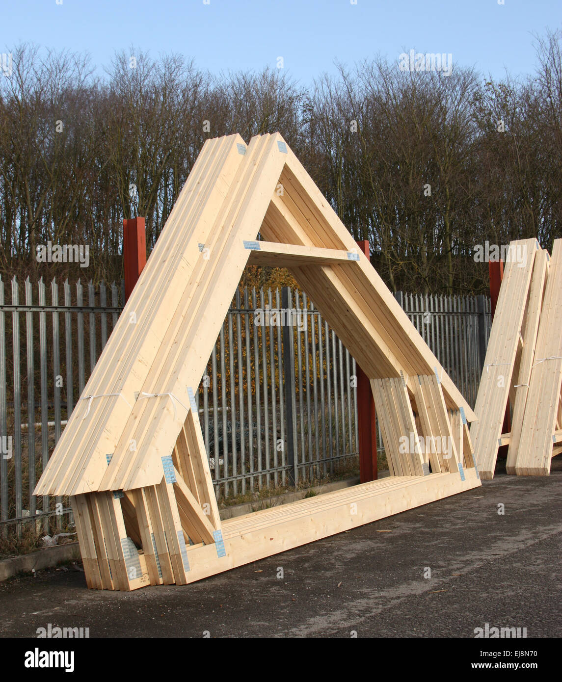 A Stack of Timber Roof Trusses in a Stock Yard Stock Photo - Alamy