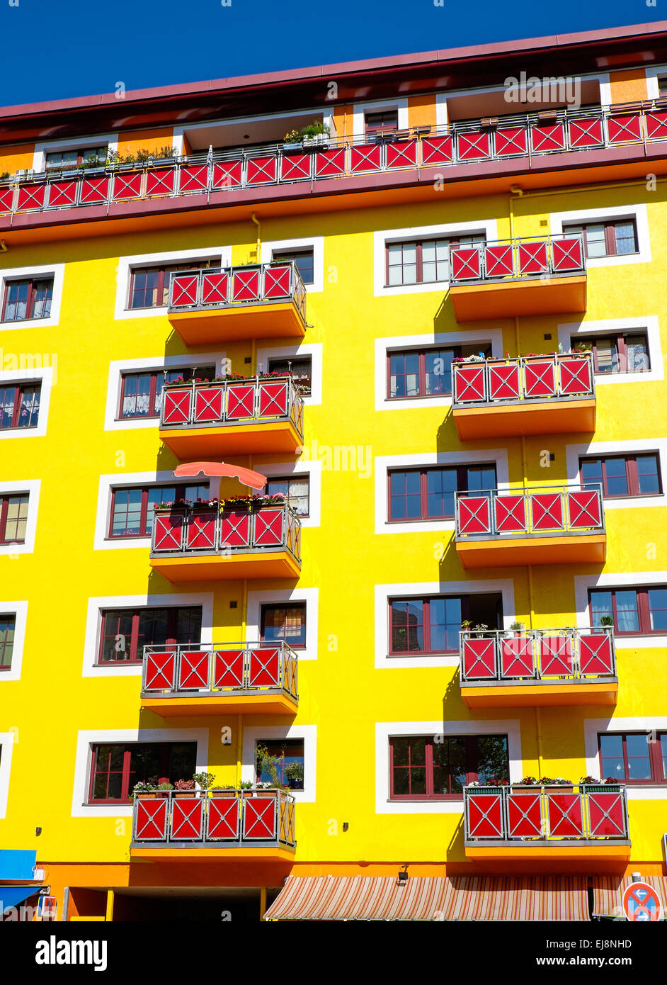 Yellow apartment house facade Stock Photo - Alamy