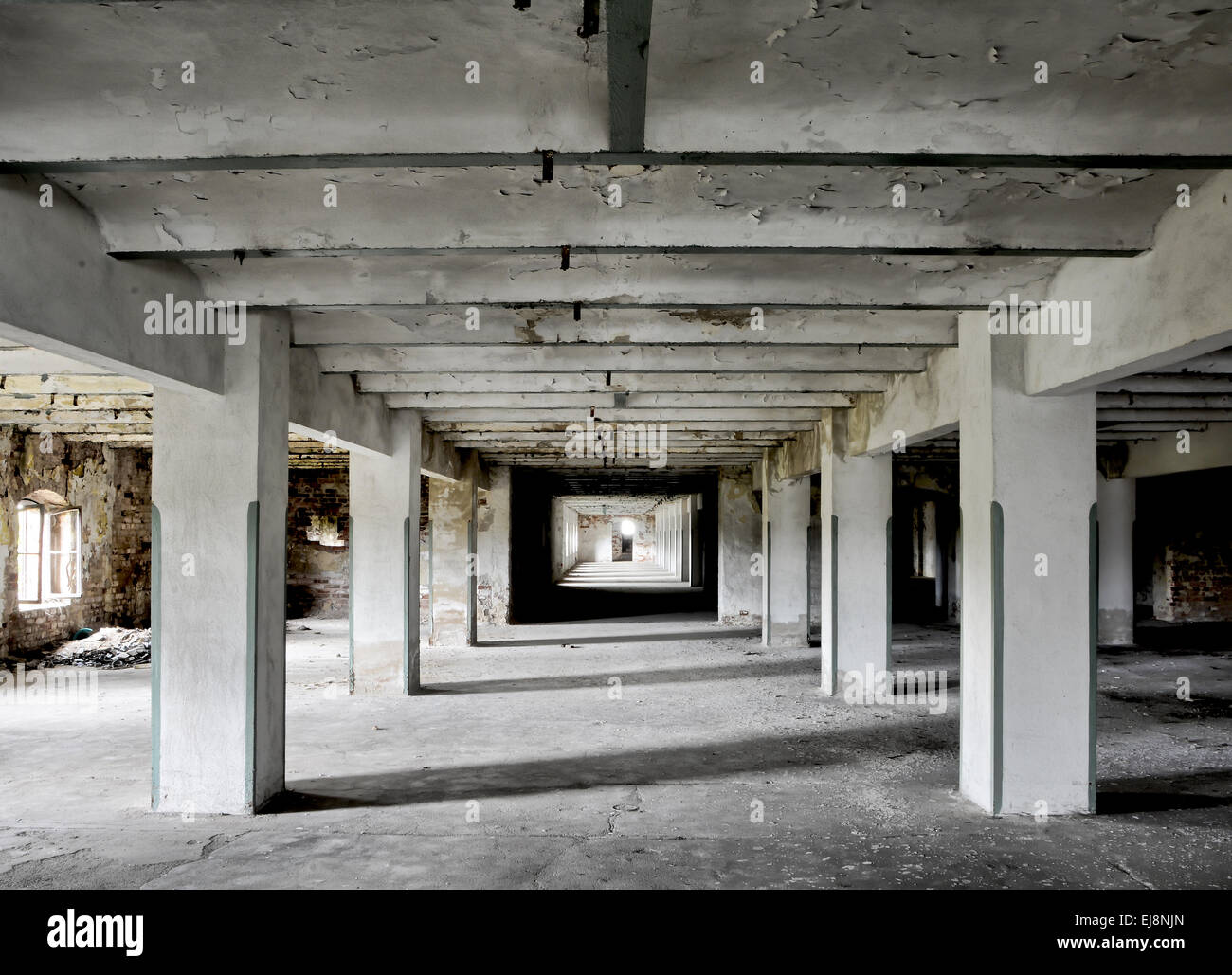 long room with thick columns Stock Photo - Alamy