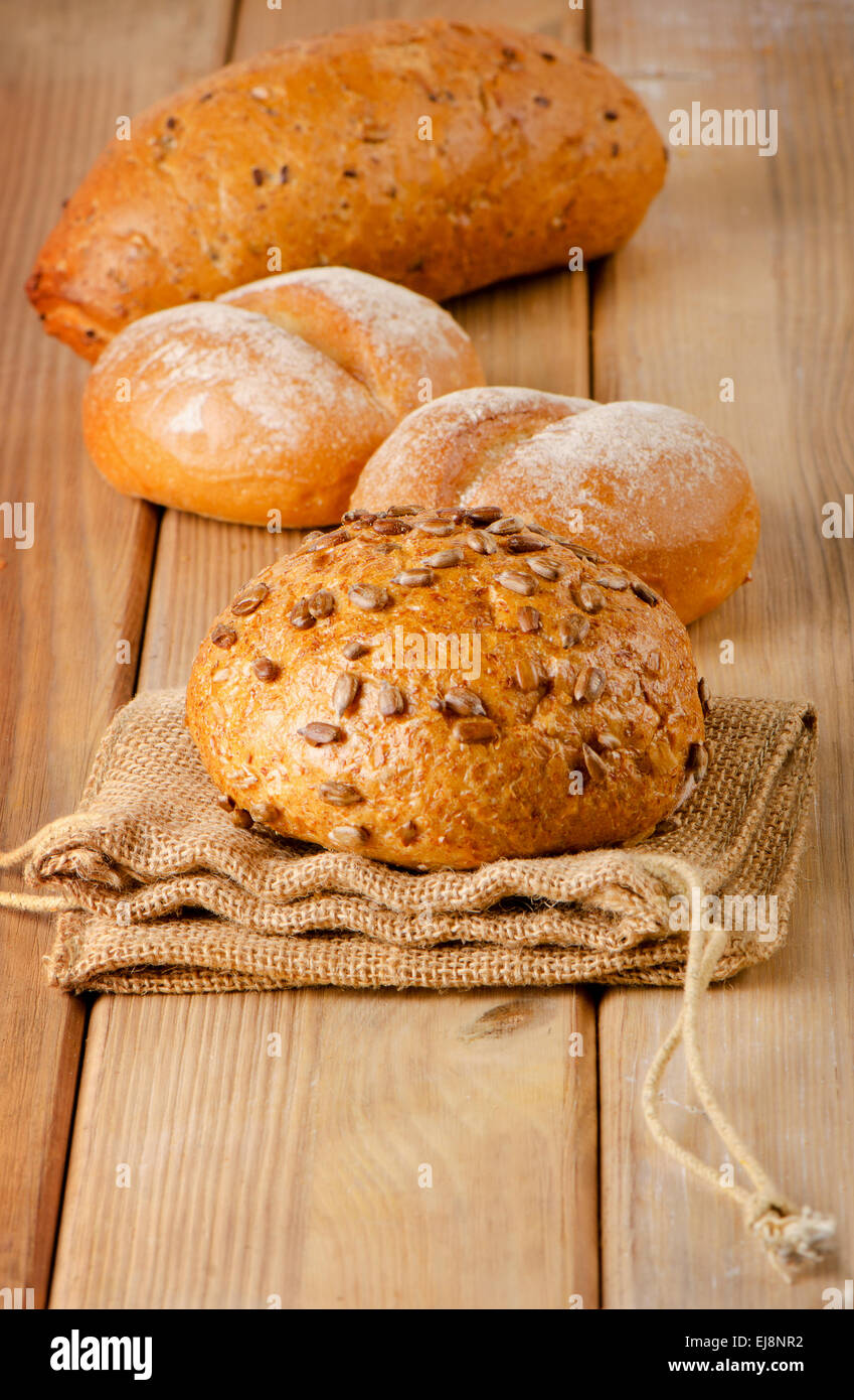 Fresh healthy natural bread on a wooden board. Selective focus Stock ...