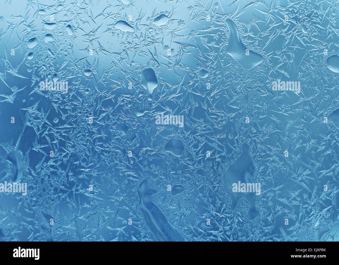 Natural ice pattern and water drops on glass Stock Photo - Alamy