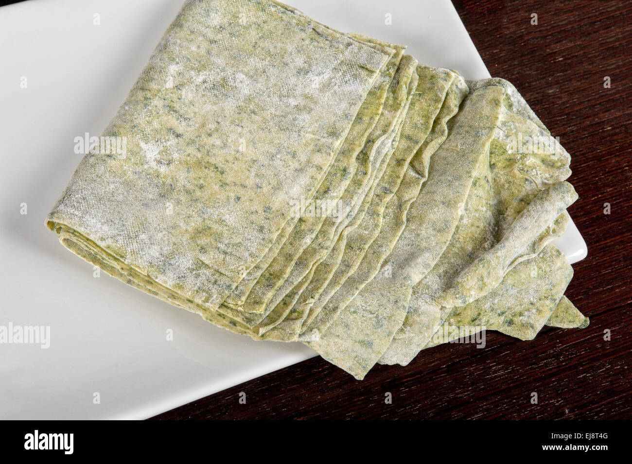 Piece lasagna dough on kitchen hi-res stock photography and images - Alamy
