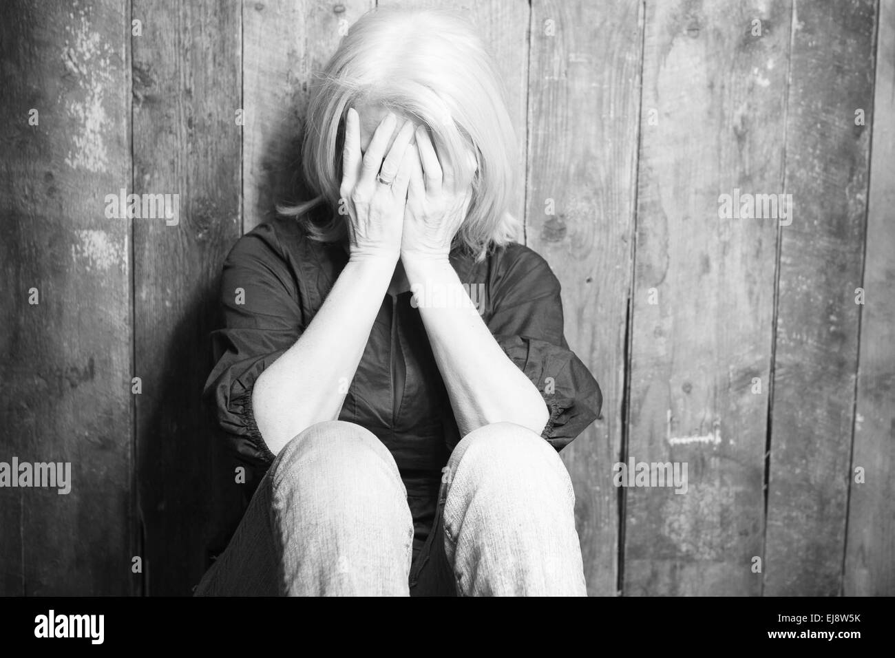 depress senior person with wood background Stock Photo - Alamy