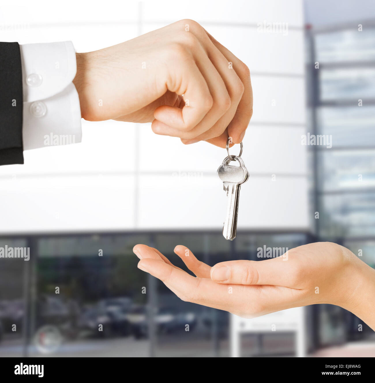 man and woman with house keys Stock Photo - Alamy