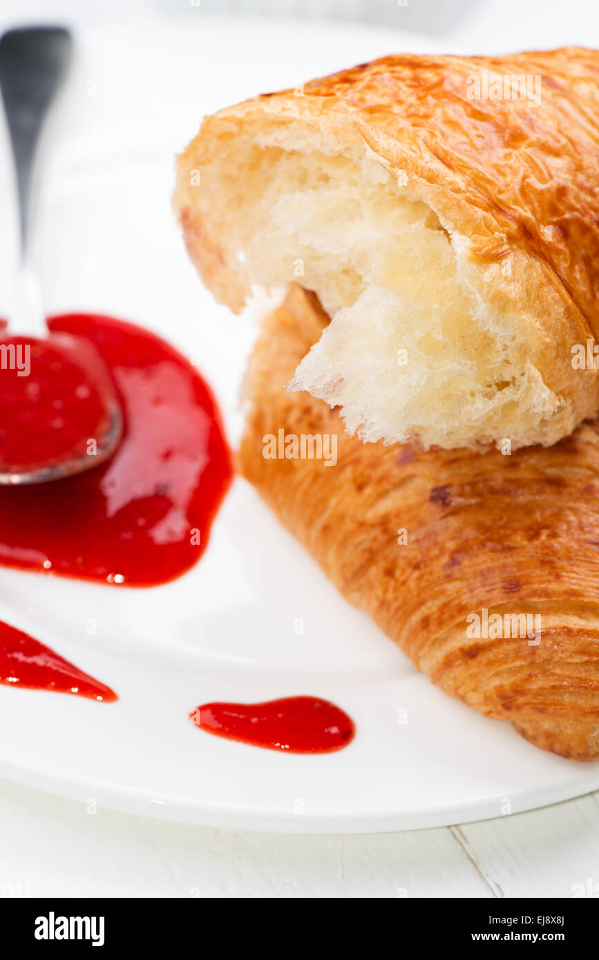 Croissant strawberry jam spoon Stock Photo - Alamy