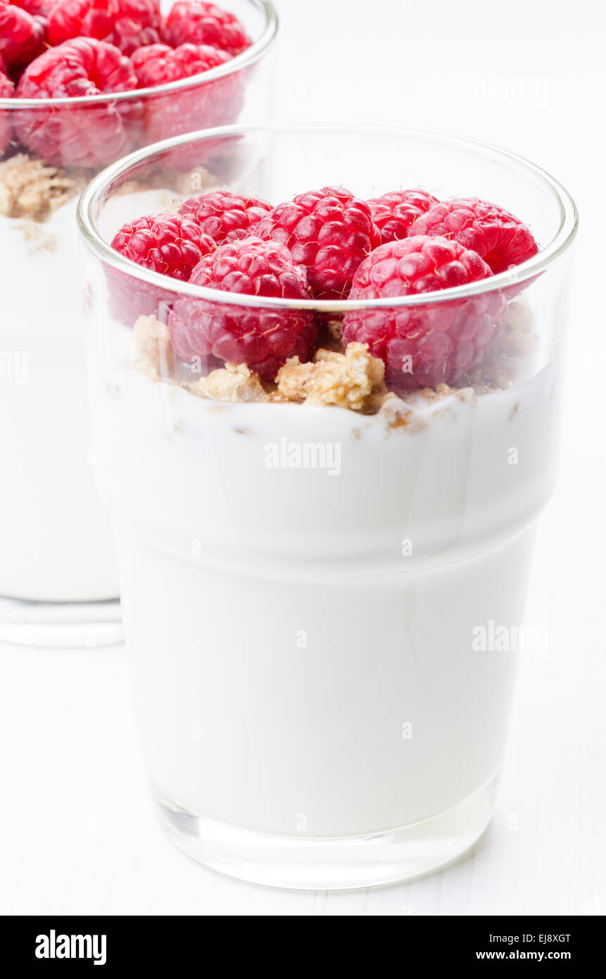 Raspberry desert in glass vertical Stock Photo - Alamy