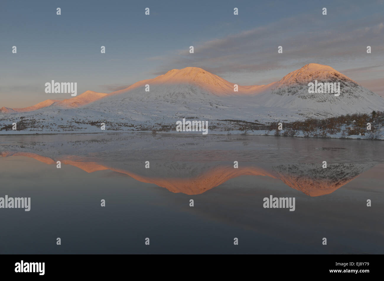 mountains reflecting in a lake, Rondane, Norway Stock Photo - Alamy