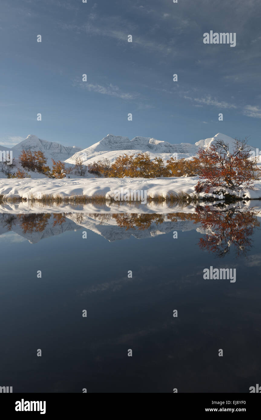 mountains reflecting in a lake, Rondane, Norway Stock Photo - Alamy