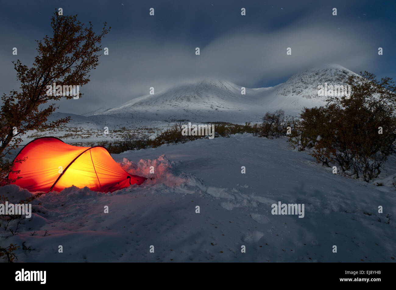 illuminated tent in snow, Rondane NP, Norway Stock Photo - Alamy
