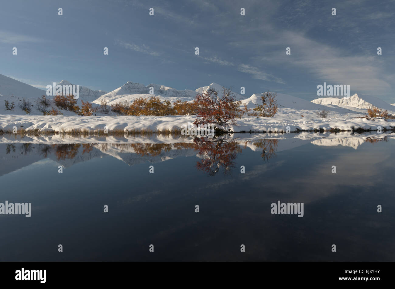 mountains reflecting in a lake, Rondane, Norway Stock Photo - Alamy