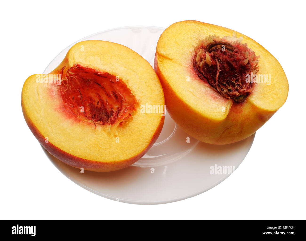 Sliced peach on the plate, isolated Stock Photo - Alamy