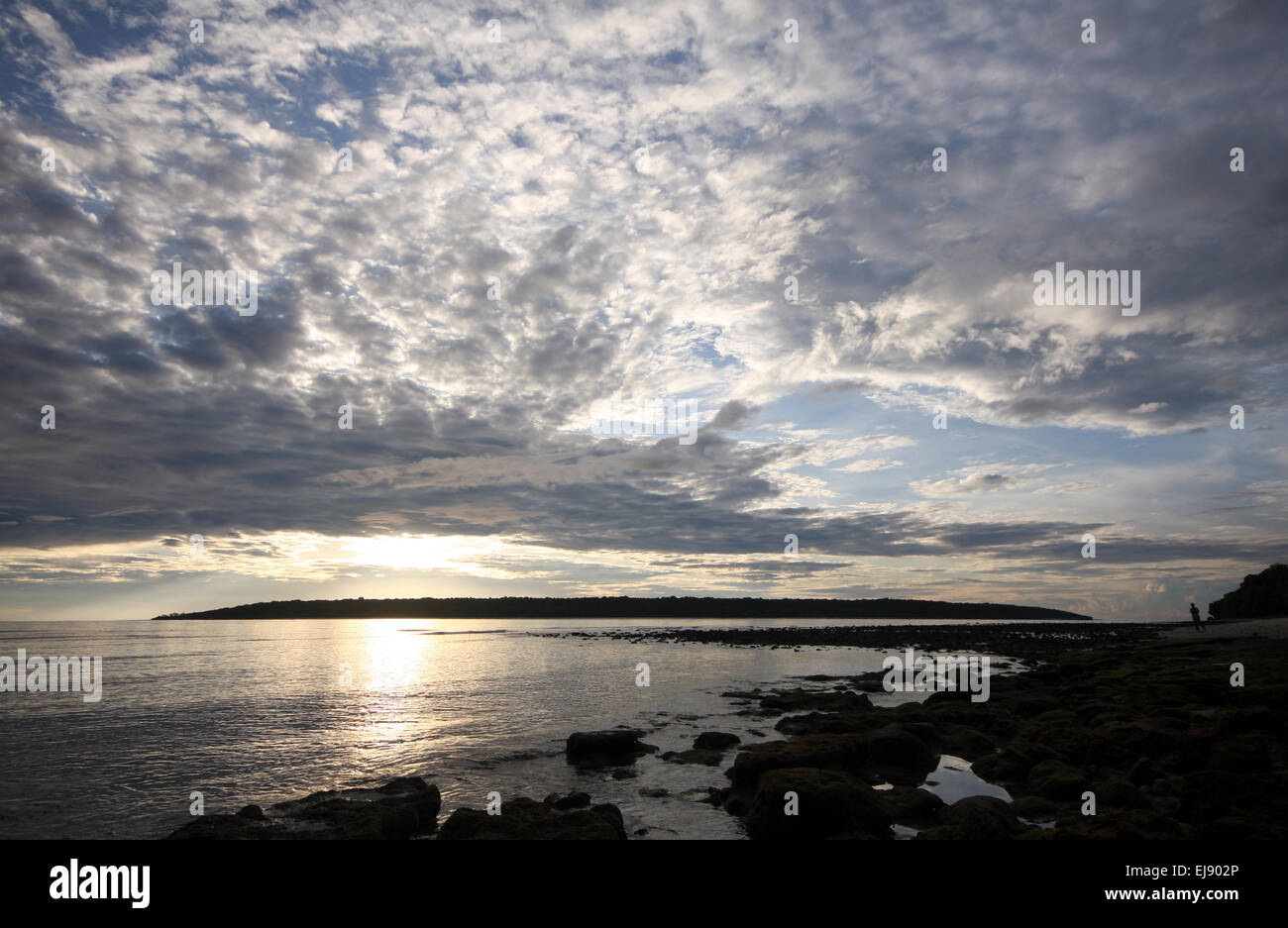 Valu Beach at sunset, looking over to Jaco Island, Timor Leste Stock ...