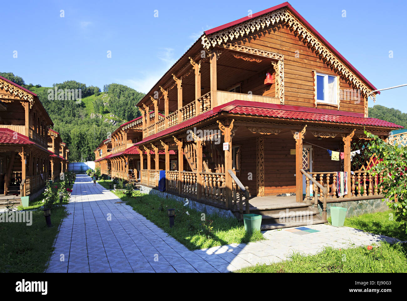 Beautiful wooden cottages in the mountains Stock Photo - Alamy