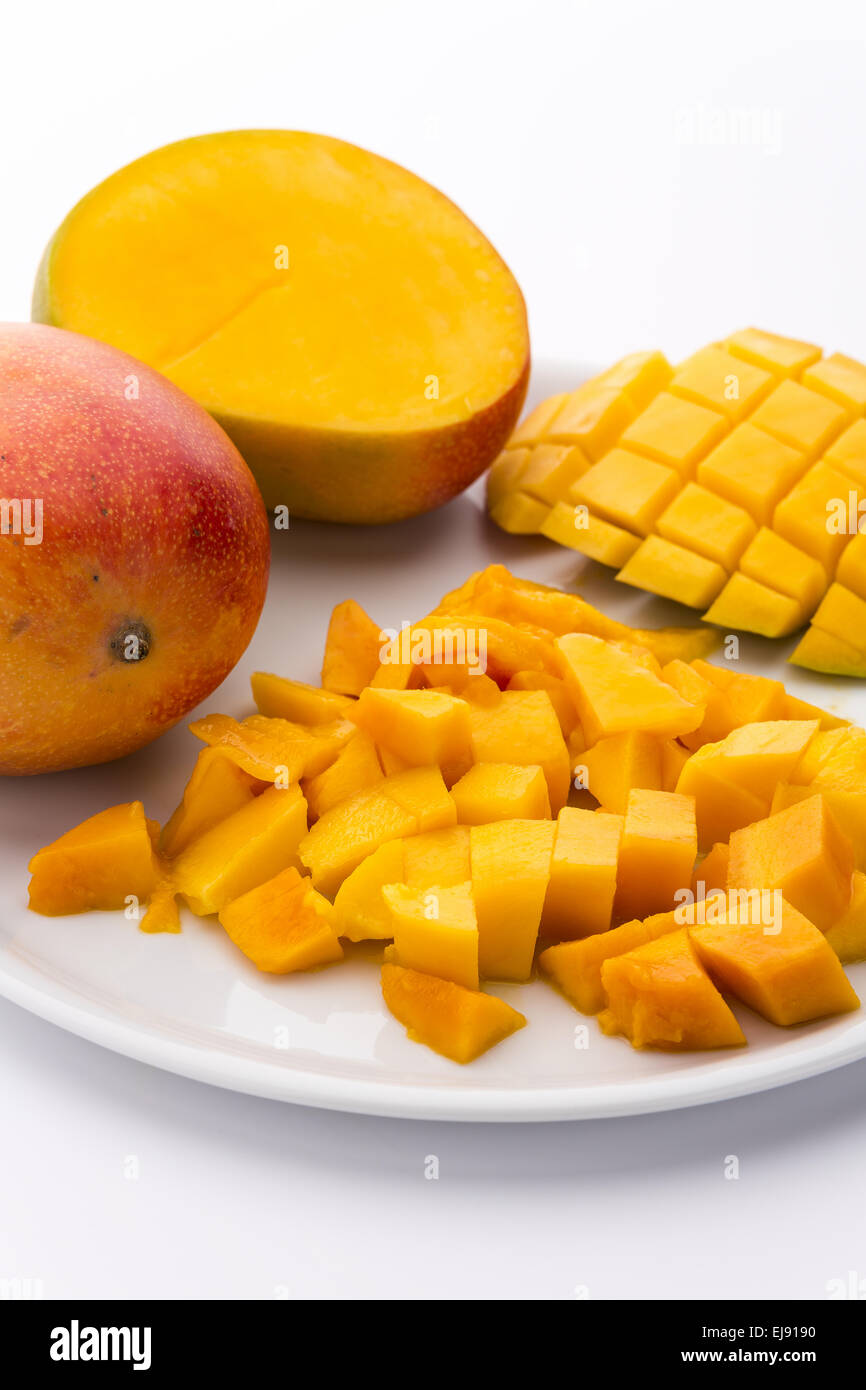 Mangos and diced fruit pulp Stock Photo - Alamy