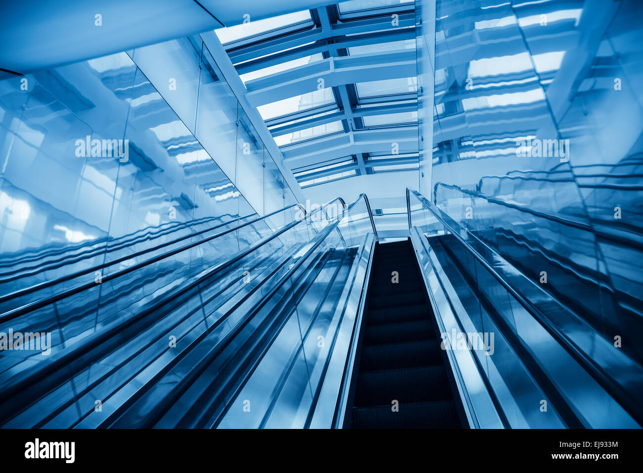 modern blue escalator Stock Photo - Alamy