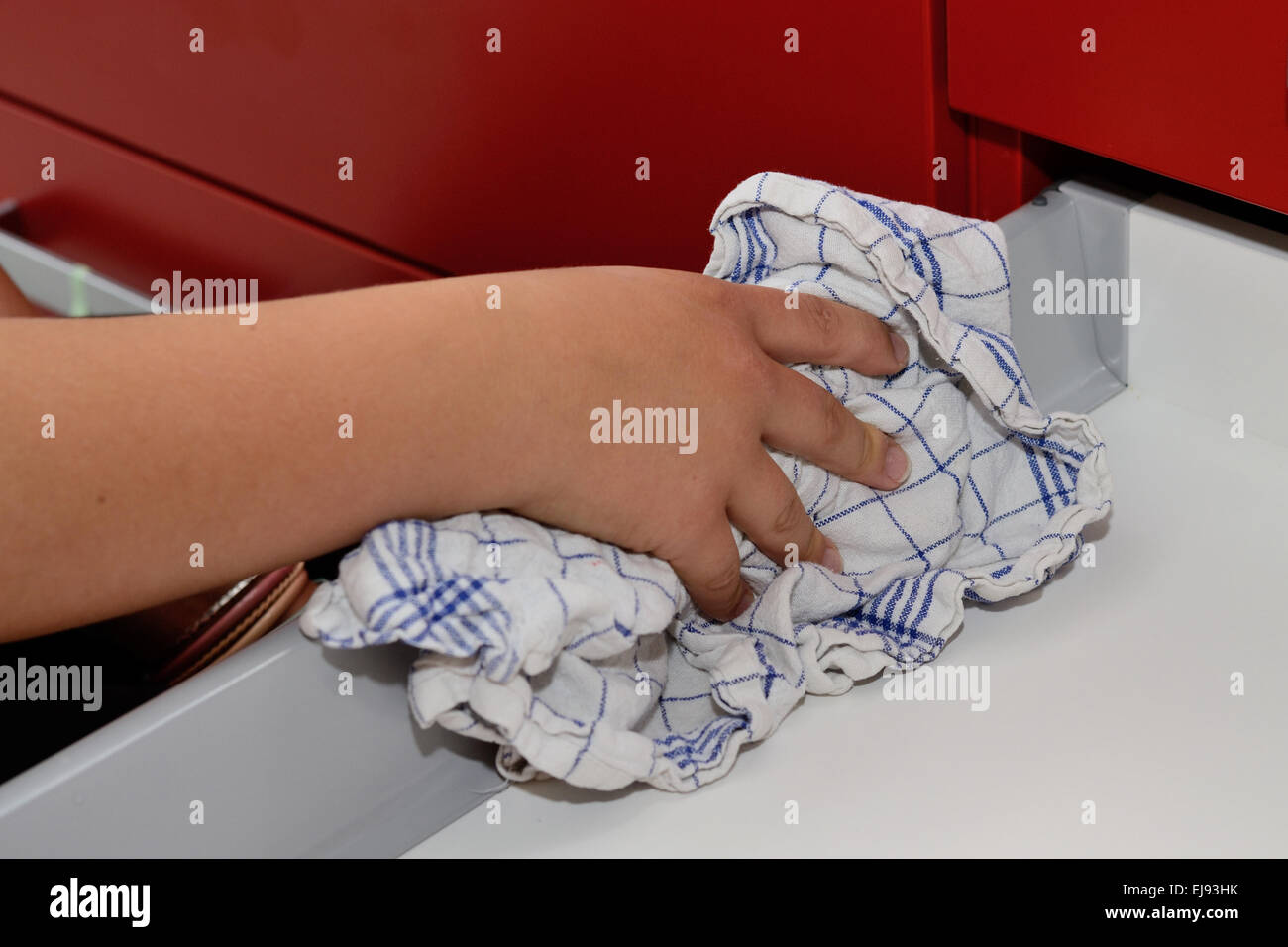 Person cleans rags Stock Photo - Alamy