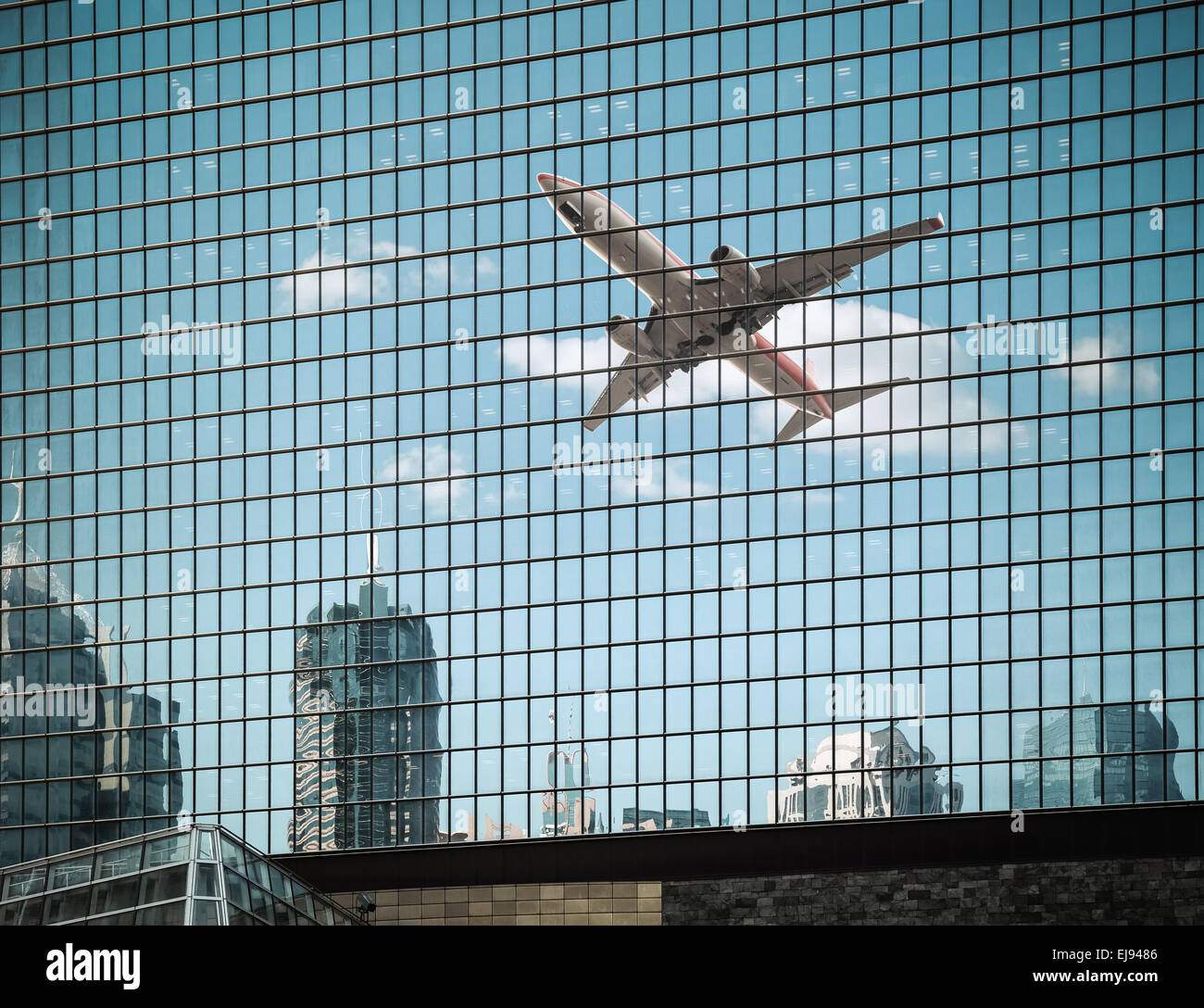 airplane are reflected on the glass curtain wall Stock Photo - Alamy