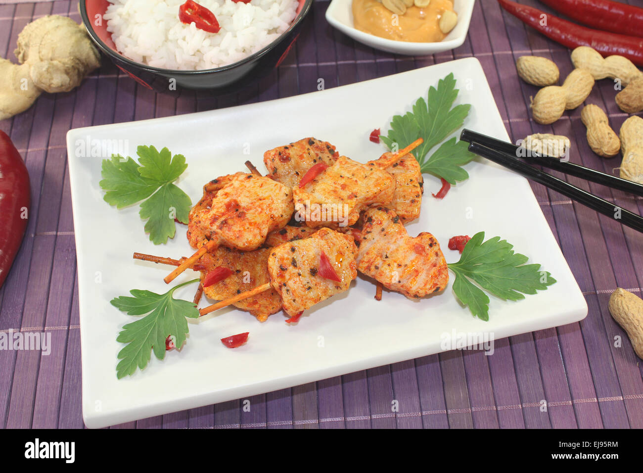 Asian satay skewers with chilli and rice Stock Photo - Alamy