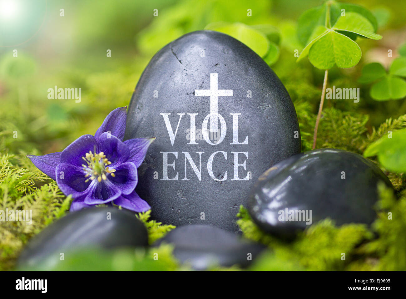 Black stone with the Word „Violence“ Stock Photo - Alamy