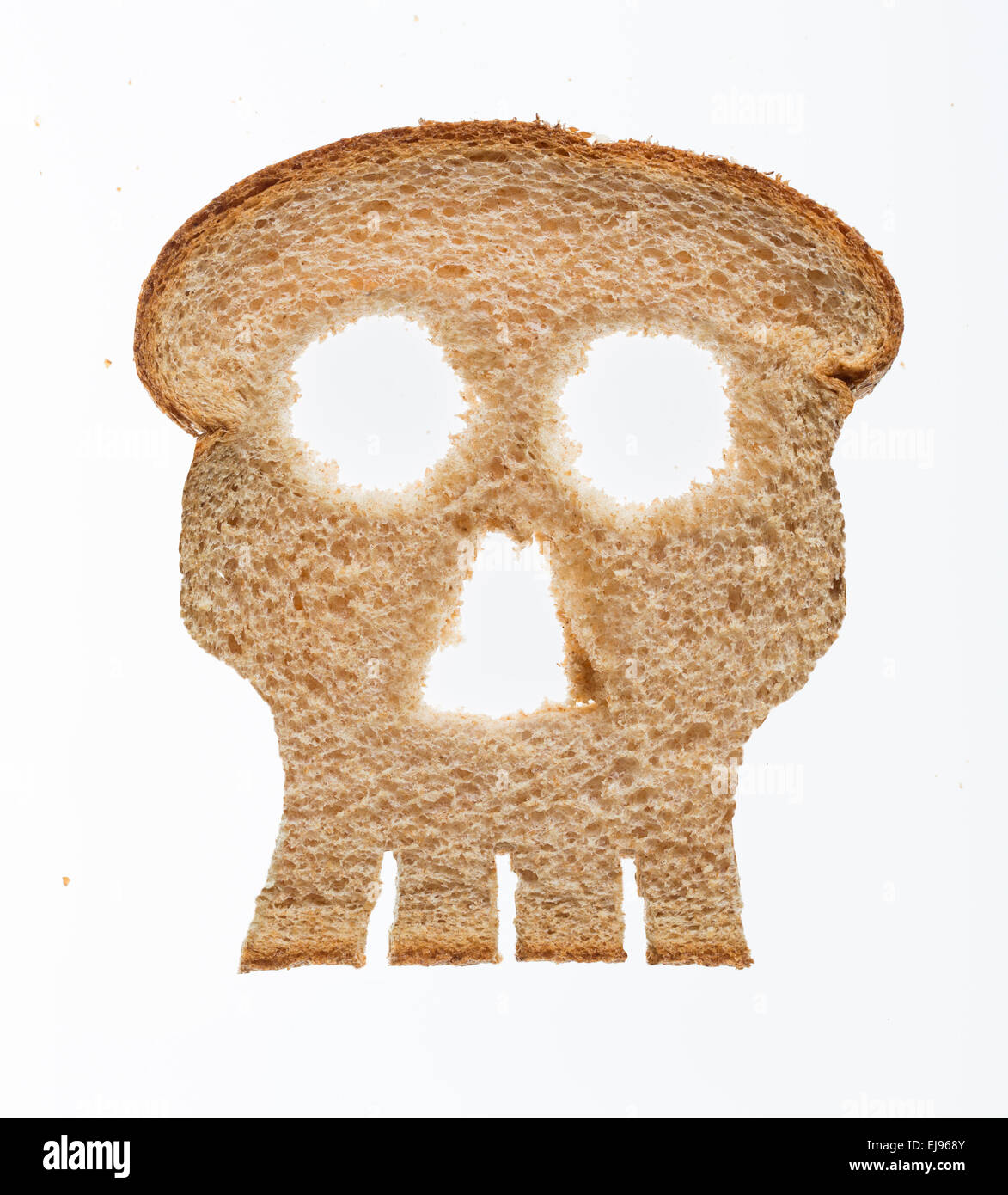 Slice of wholewheat bread in shape of skull Stock Photo - Alamy