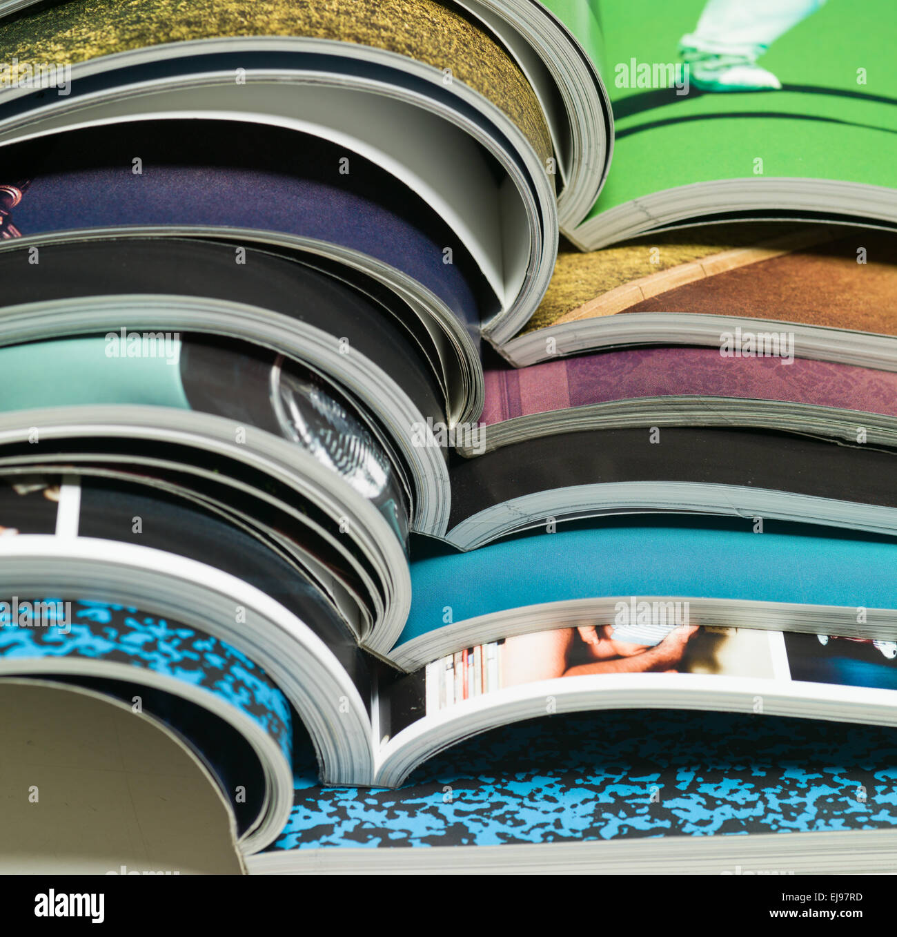 stack of open magazines Stock Photo - Alamy