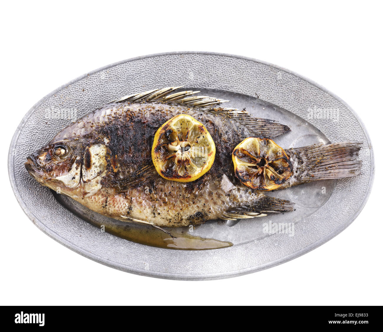 Whole baked fish Cut Out Stock Images & Pictures - Alamy