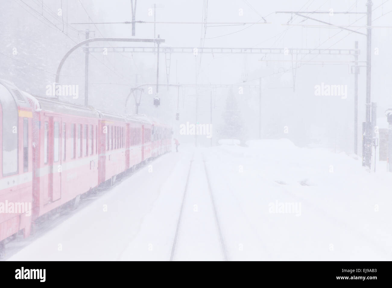 Train in the snow Stock Photo - Alamy