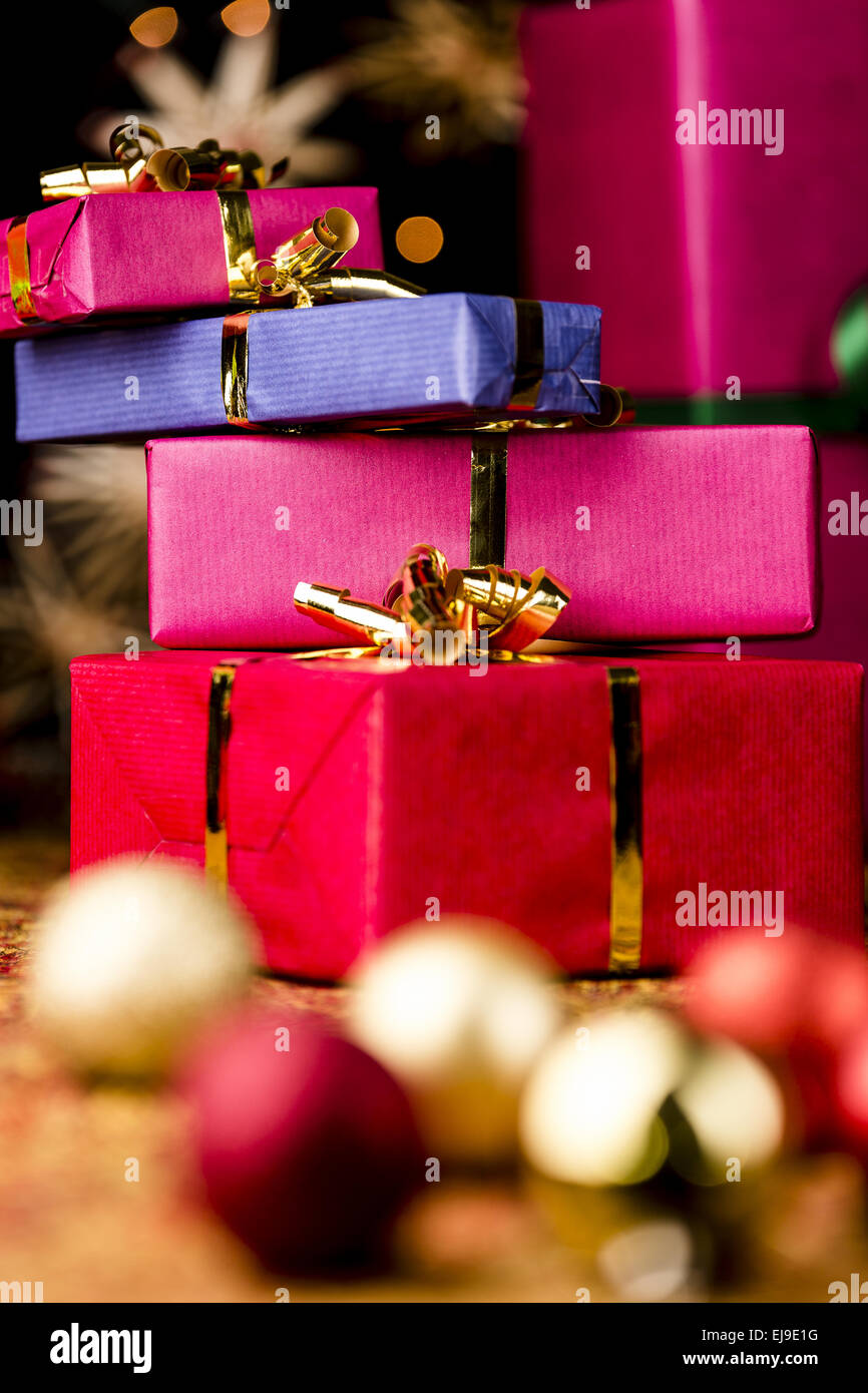 Stack of Four Presents and Spheres Stock Photo - Alamy