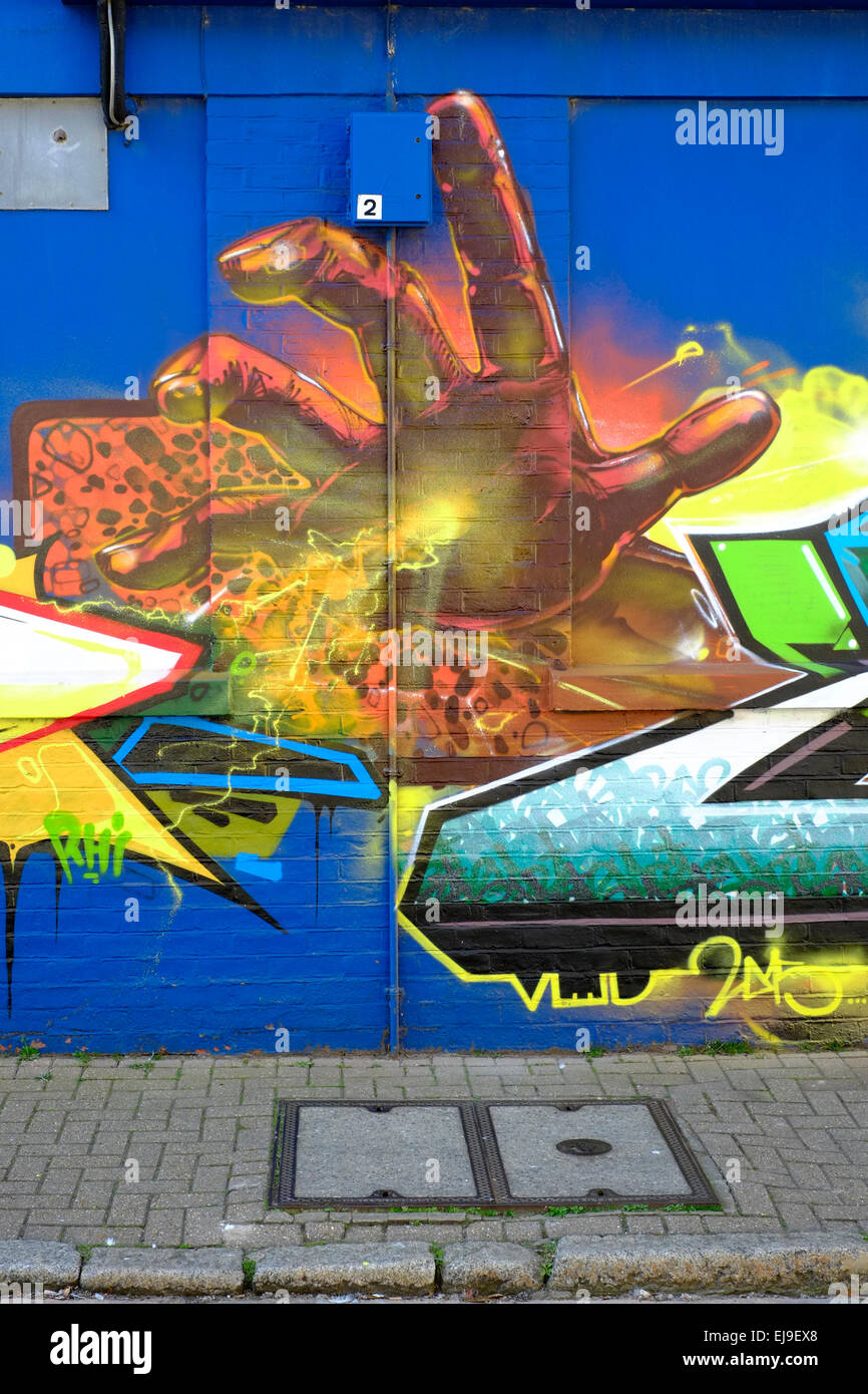modern street art graffiti spray painted on a wall Stock Photo - Alamy